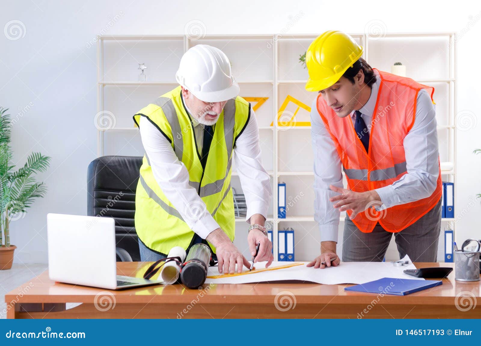 The Two Engineers Colleagues Working Under Project Stock Image - Image ...