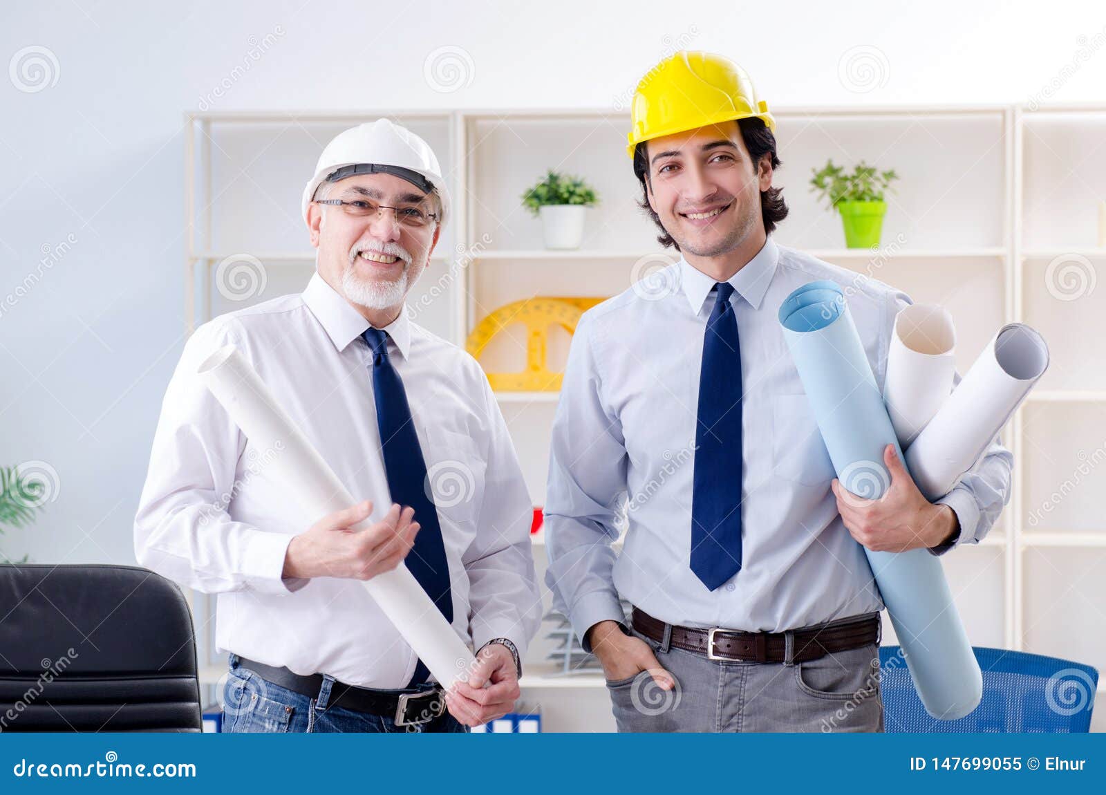 The Two Engineers Colleagues Working Under Project Stock Image - Image ...