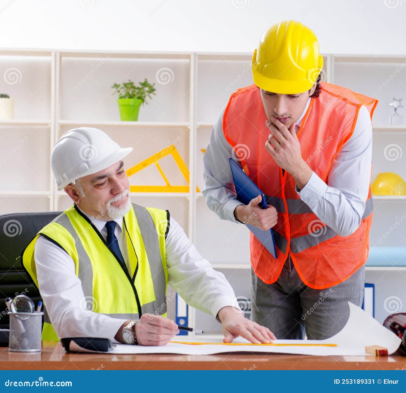 Two Engineers Colleagues Working Under Project Stock Image - Image of ...
