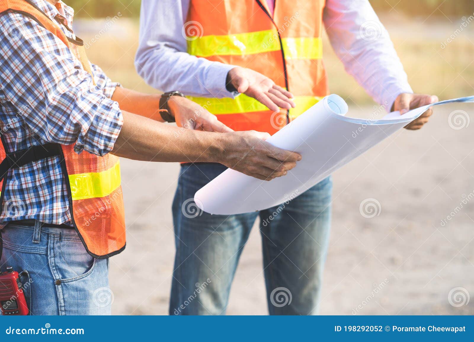 Two Engineers Discussing on Blueprint of Project Stock Photo - Image of ...