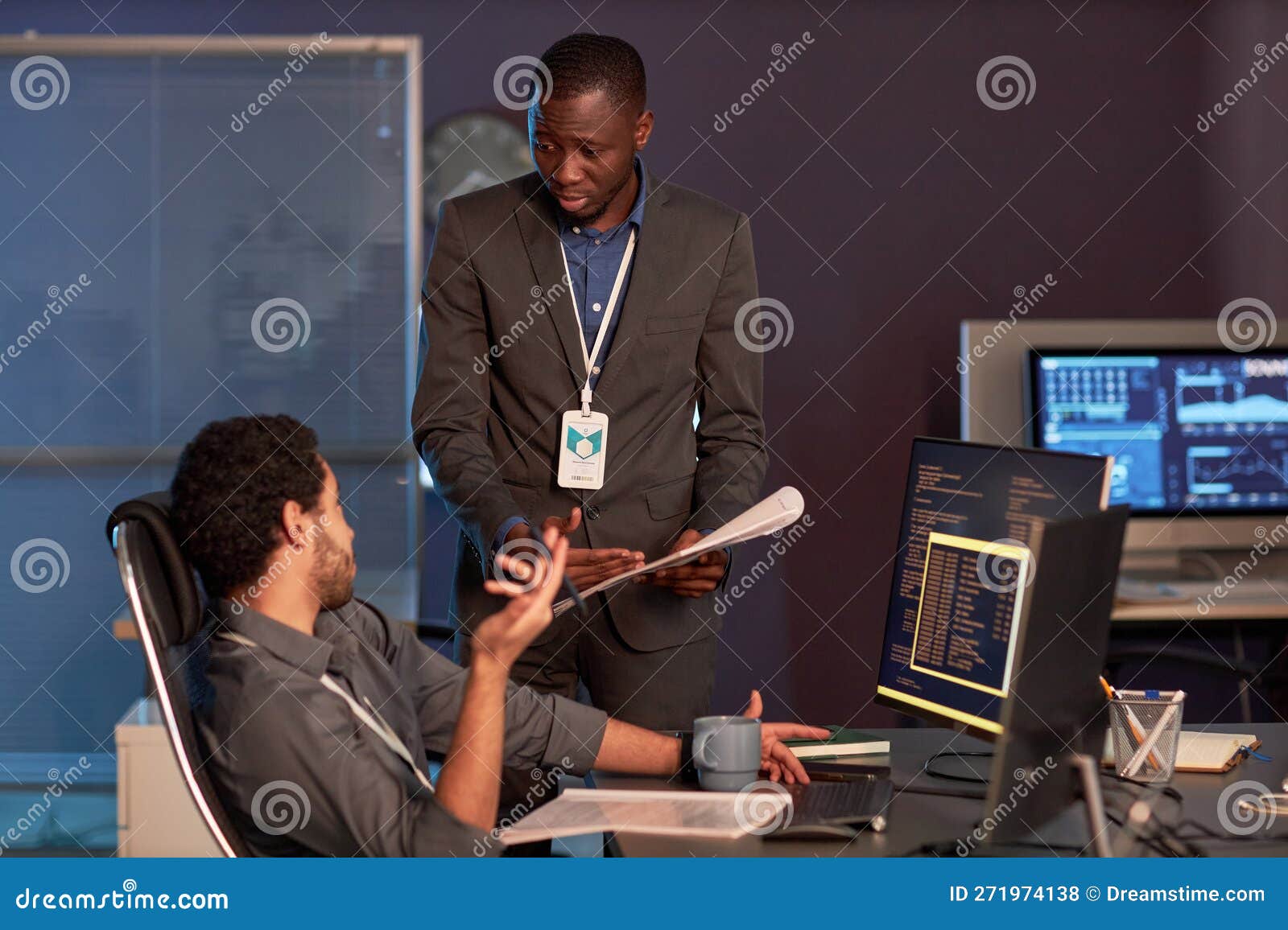 Two it Engineers Discussing Documentation at Workplace in Office Stock ...