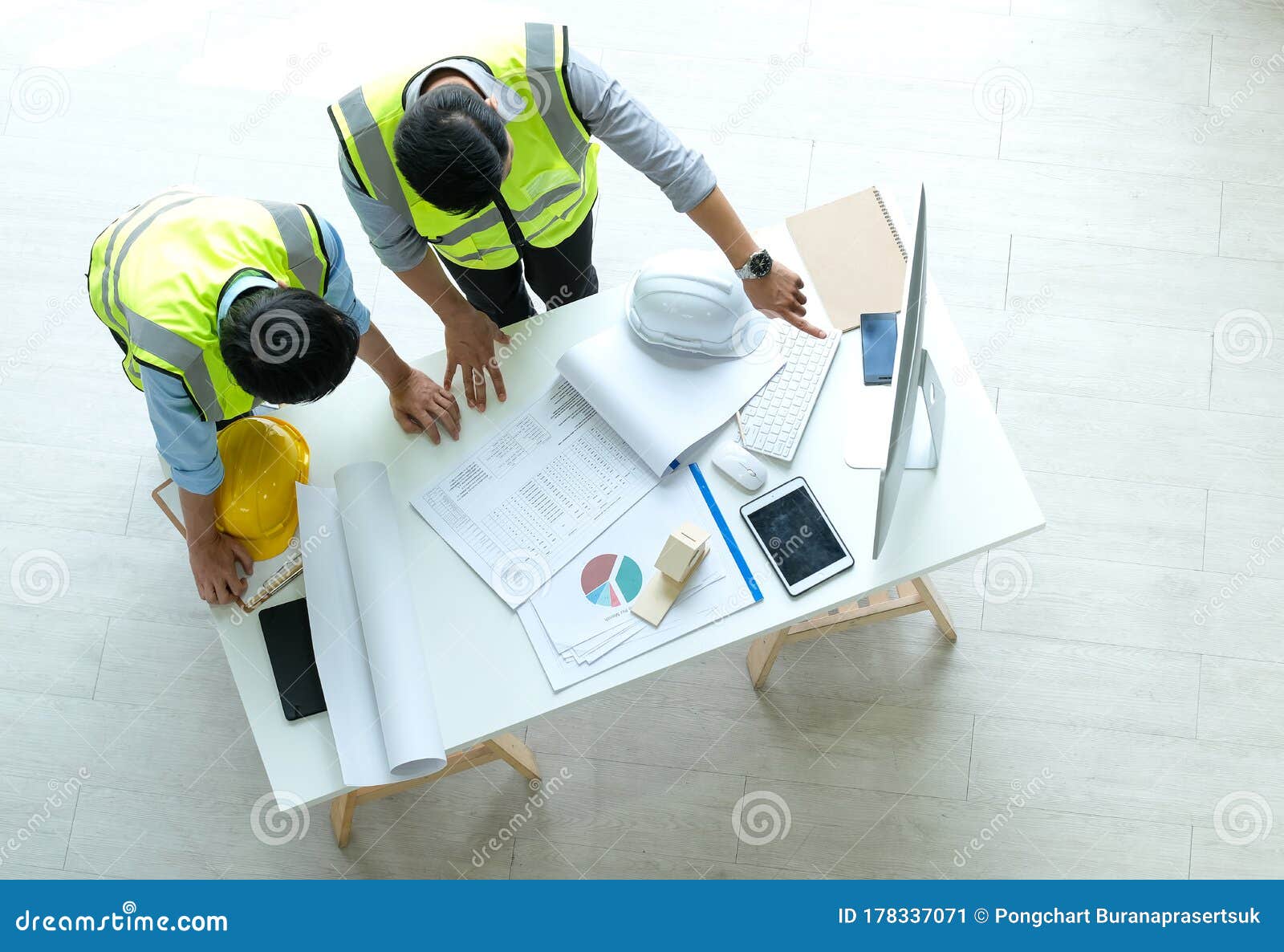 Two Engineers Man Looking at Blueprint Drawing Project Plan on the ...