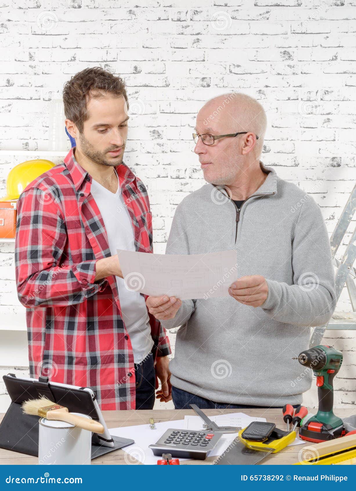 Two Engineers Reading a Plan in Office Stock Photo - Image of planning ...
