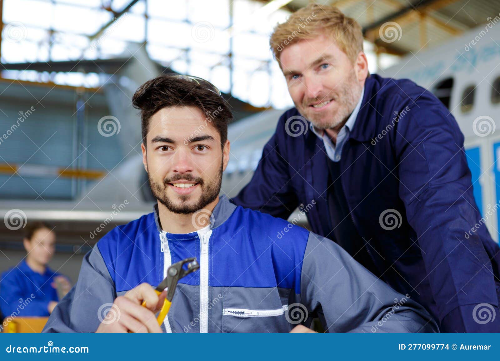 Two Engineers Repairing Plane Stock Photo - Image of detail, worker ...