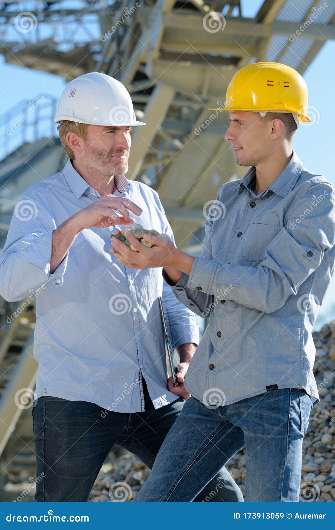 Two Engineers Talking at Construction Factory Stock Image - Image of ...