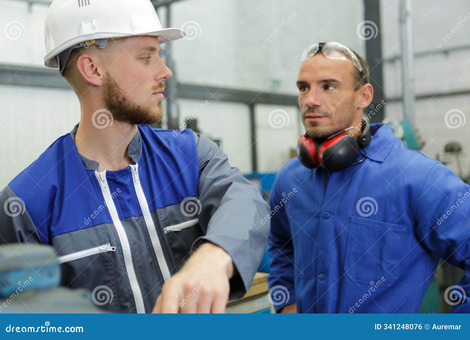 Two Engineers Talking in Factory Stock Photo - Image of manufacture ...