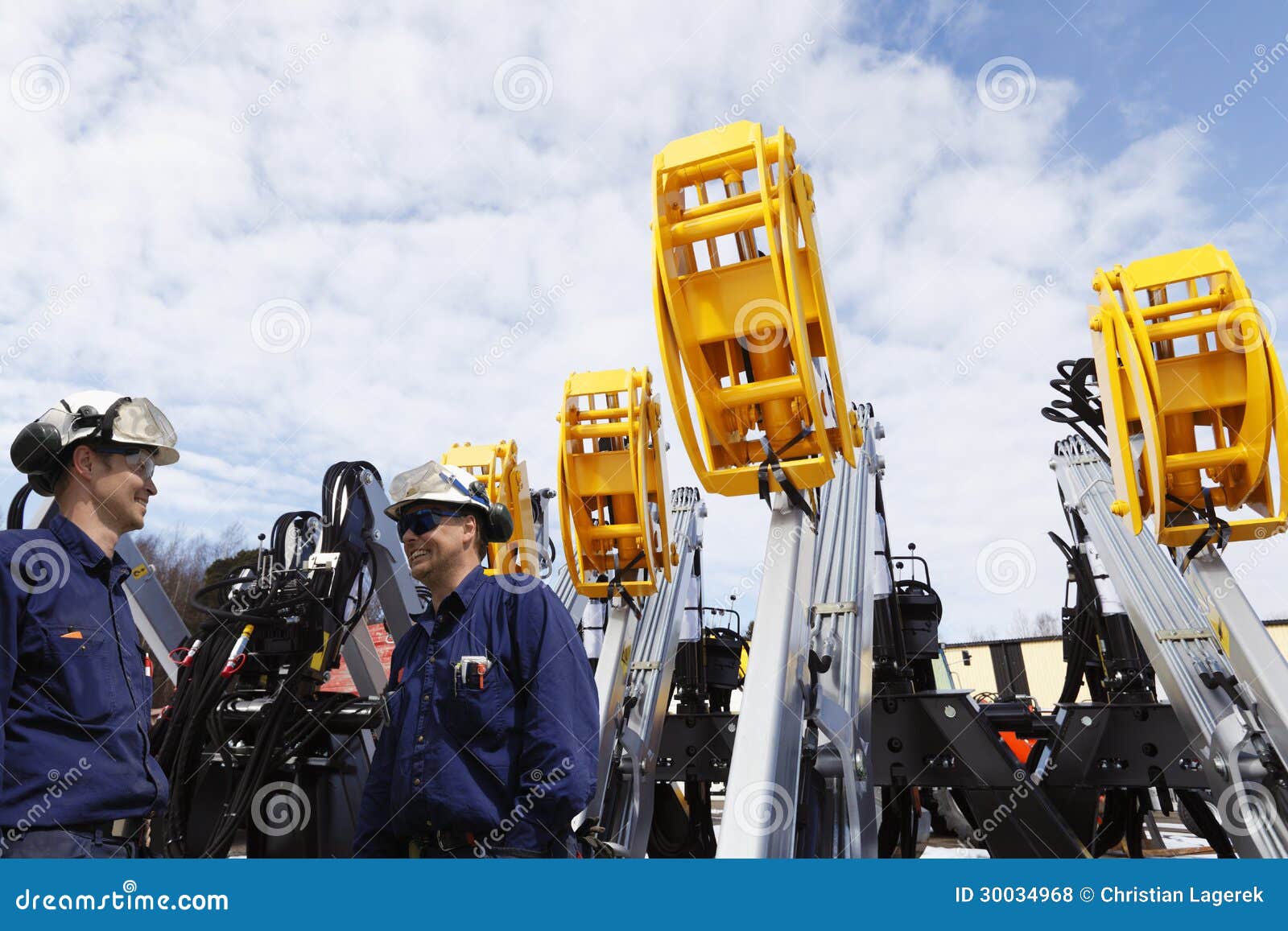 Engineers and Bulldozer Arms Stock Photo - Image of industry, plant ...