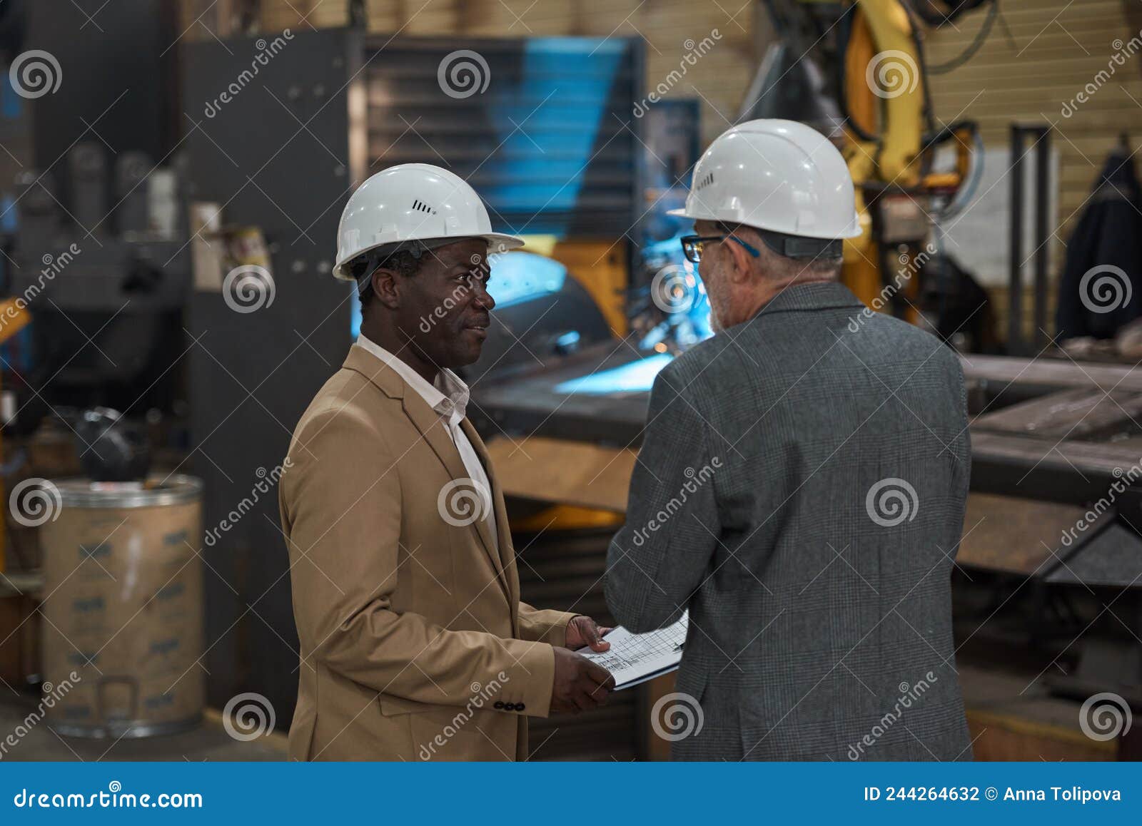 Two Engineers Talking in Modern Factory Stock Photo - Image of industry ...