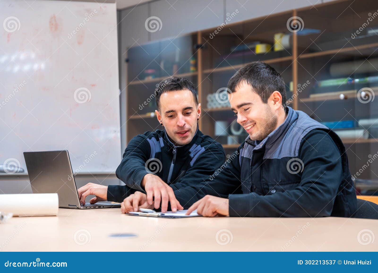 Two Engineers Talking Sitting in a Meeting Room Stock Image - Image of ...