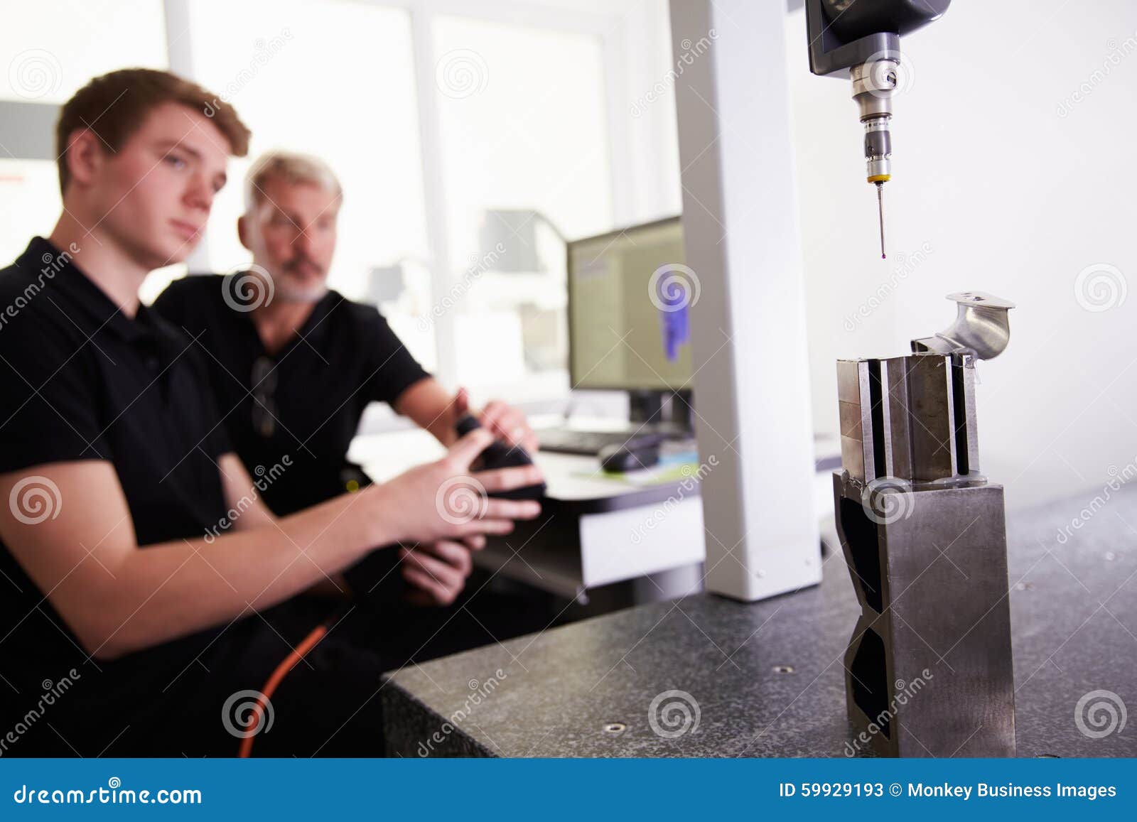 Two Engineers Using CAD System To Work on Component Stock Image - Image ...