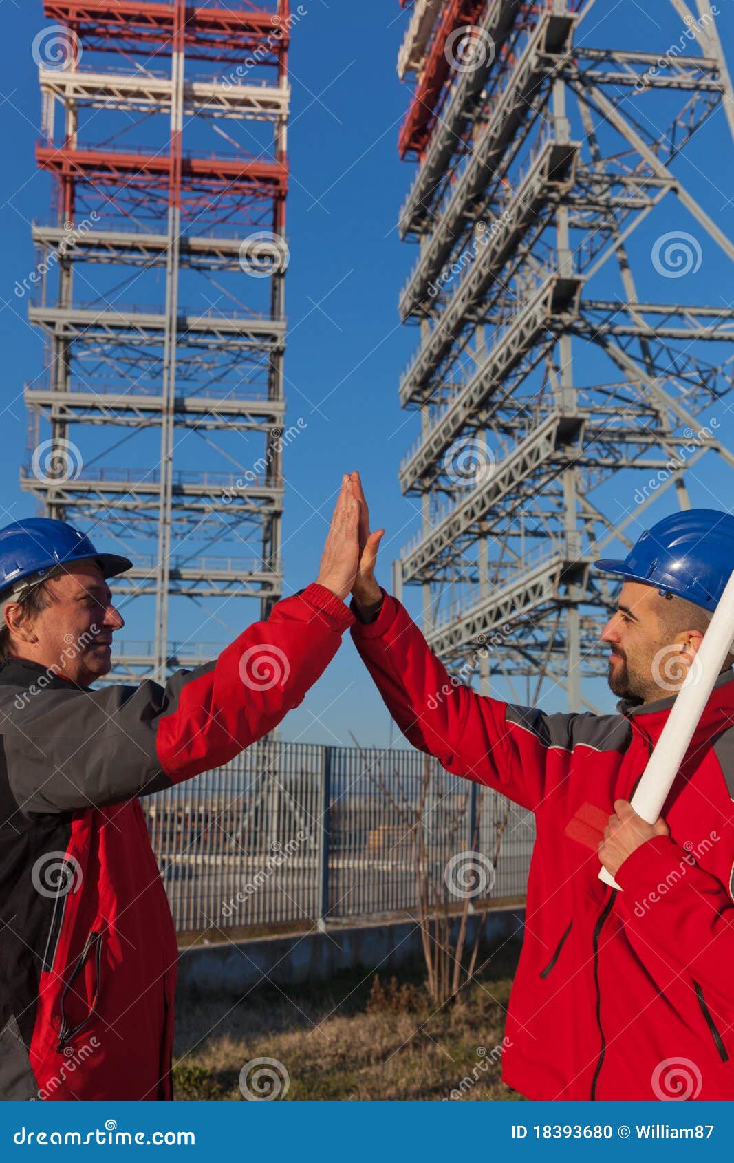 Two Engineers at Work stock photo. Image of blueprint - 18393680