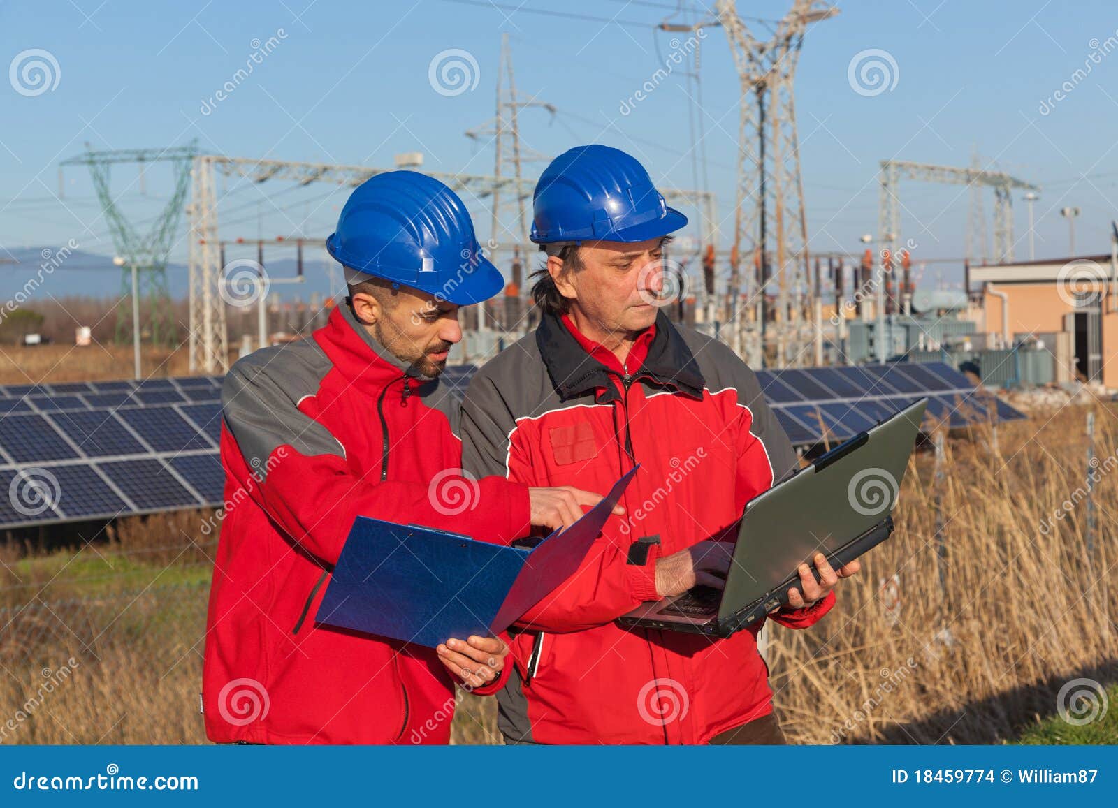 Two Engineers at Work stock photo. Image of casual, paperwork - 18459774