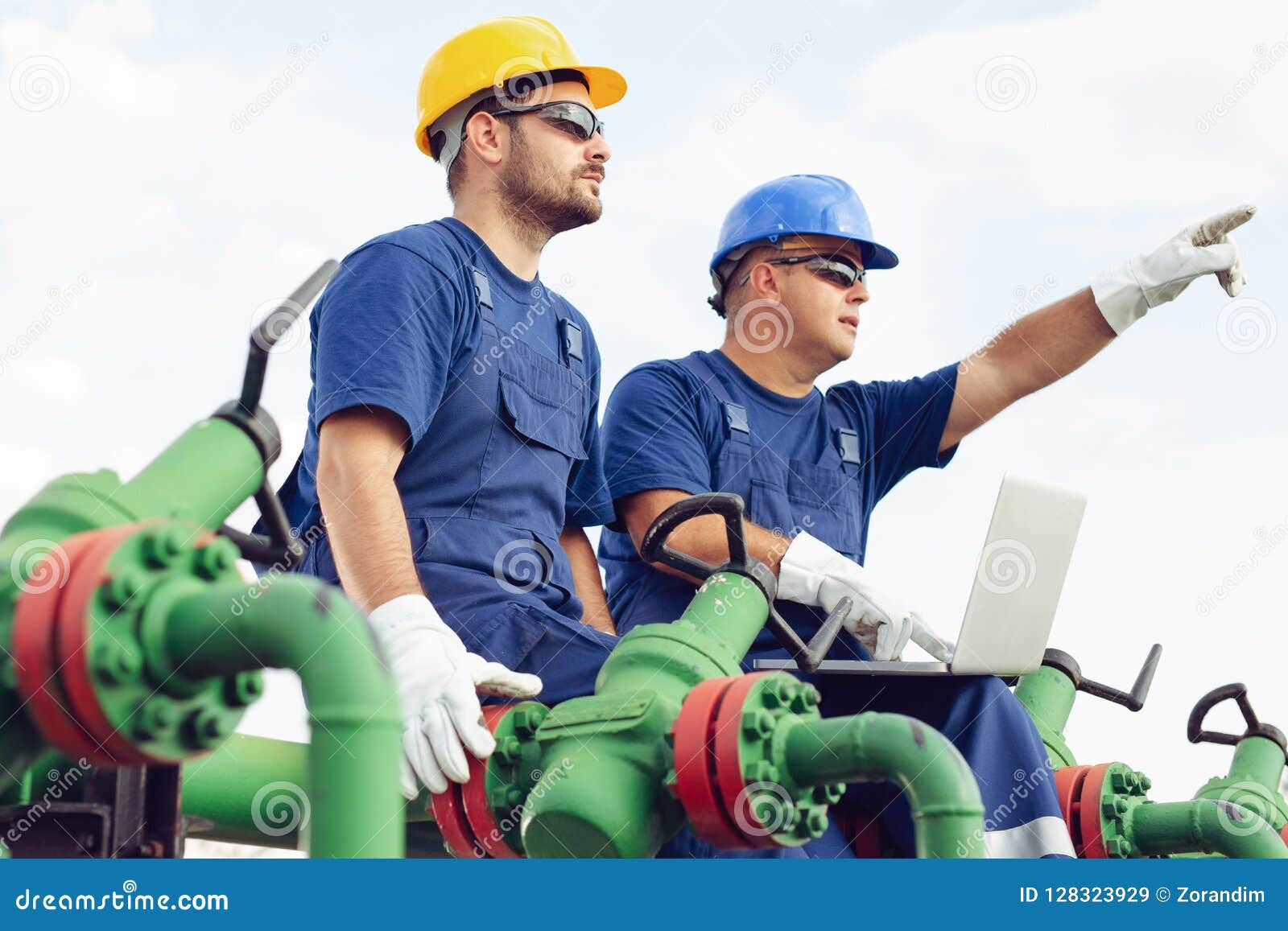 Two Engineers Working Inside Oil and Gas Refinery Stock Image - Image ...