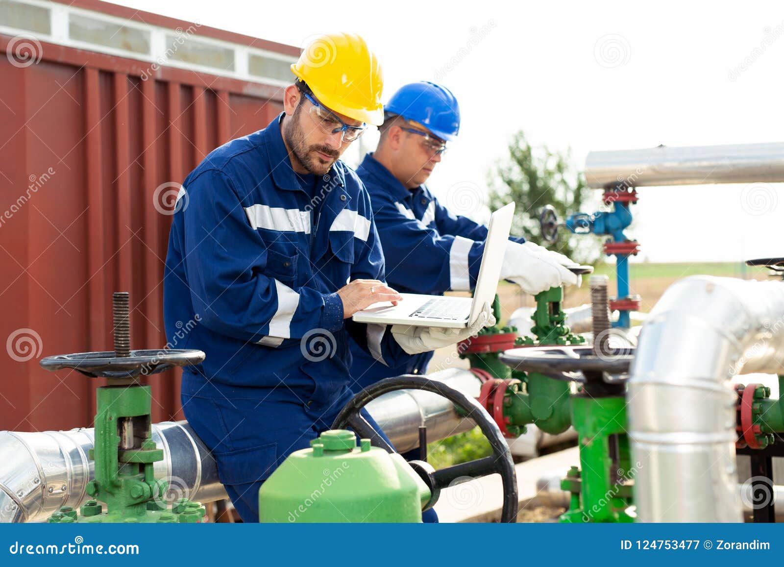 Two Engineers Working Inside Oil and Gas Refinery Stock Image - Image ...