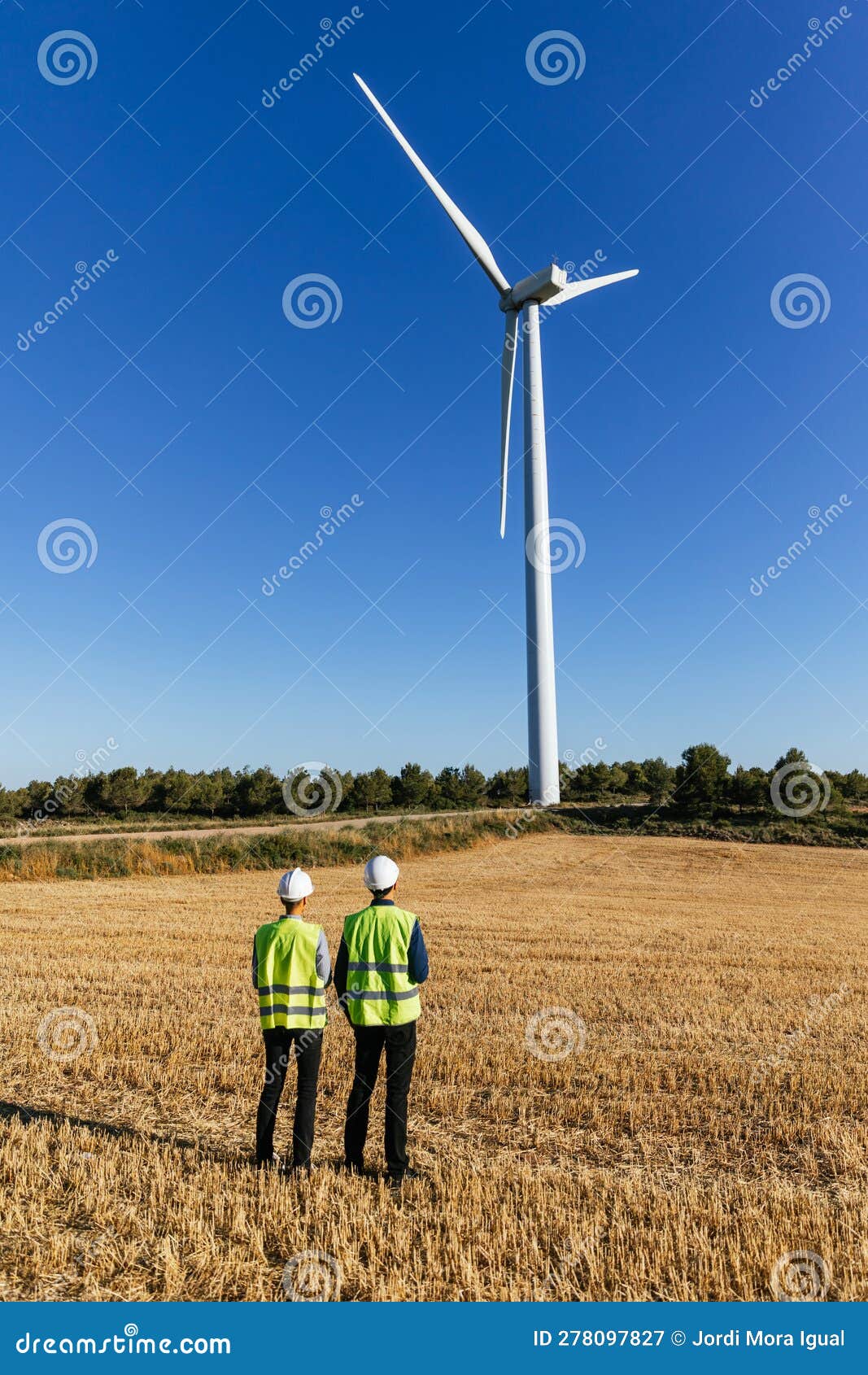 Engineers Working in a Wind Turbine Field. Stock Image - Image of power ...
