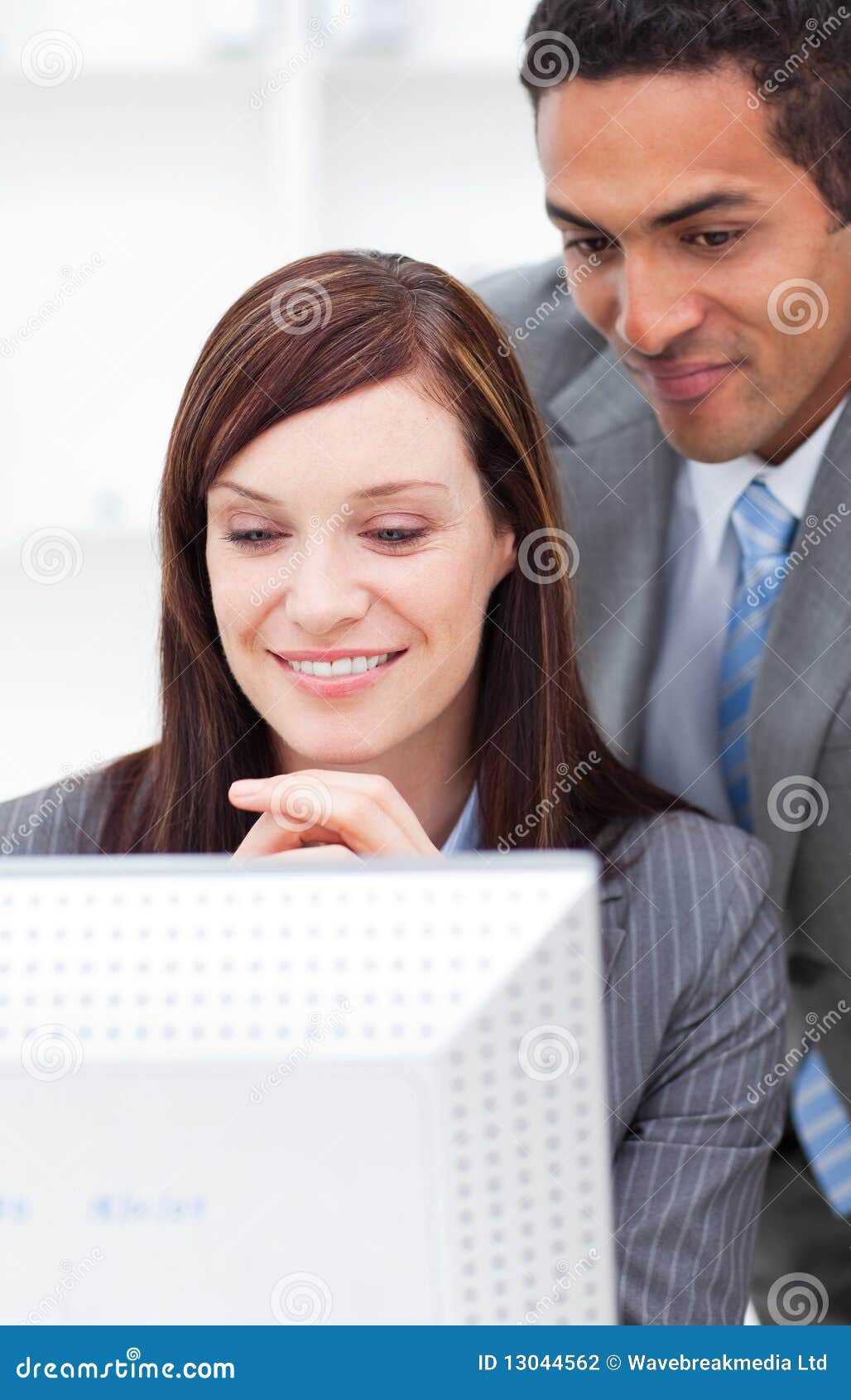 Two Enthusiastic Colleagues Working at a Computer Stock Photo - Image ...