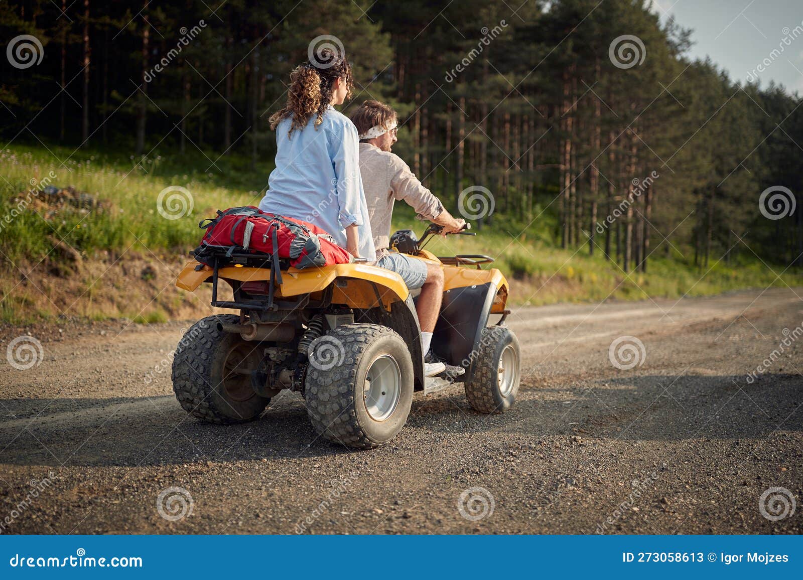 Two Enthusiastic Friends Driving Quad Together Stock Image - Image of ...
