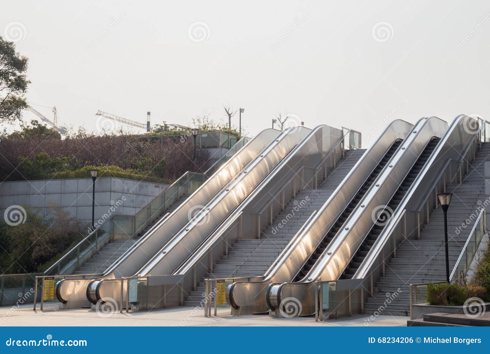 Two Escalators Outside with Sun Reflections Editorial Photo - Image of ...