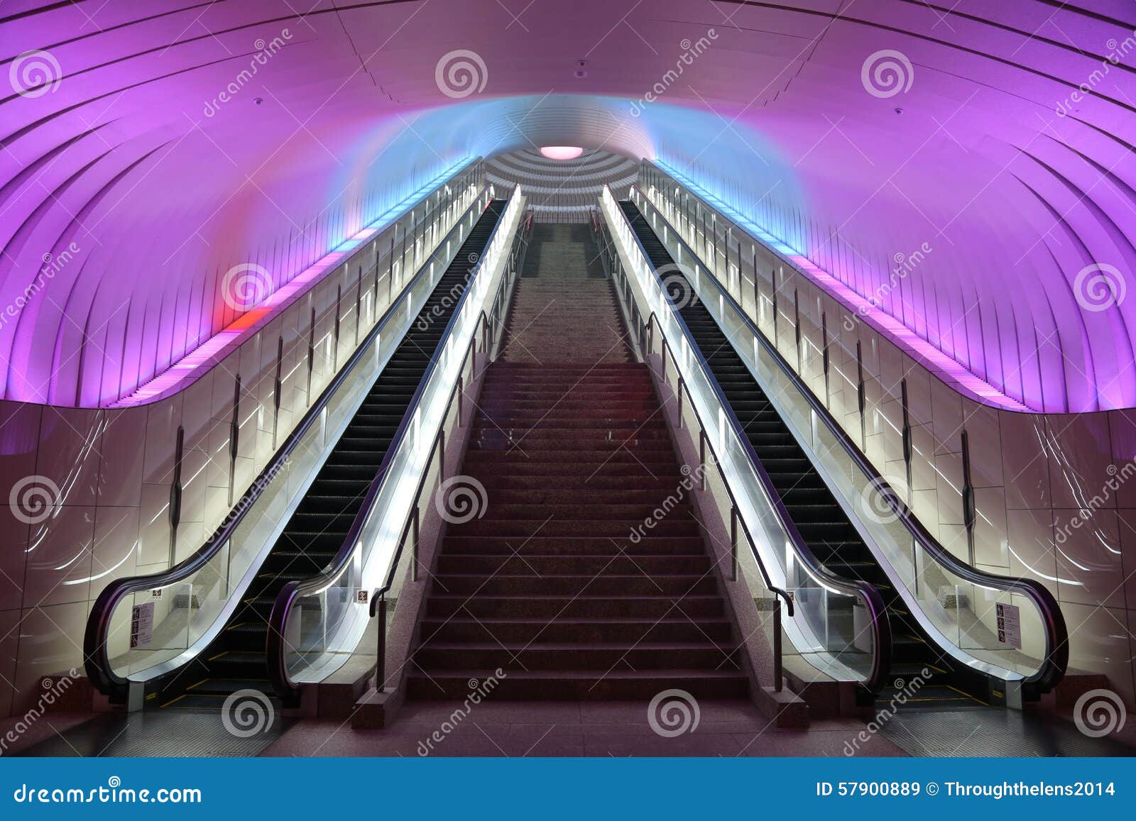 Two Escalators with Pink Light Overhead Stock Image - Image of building ...