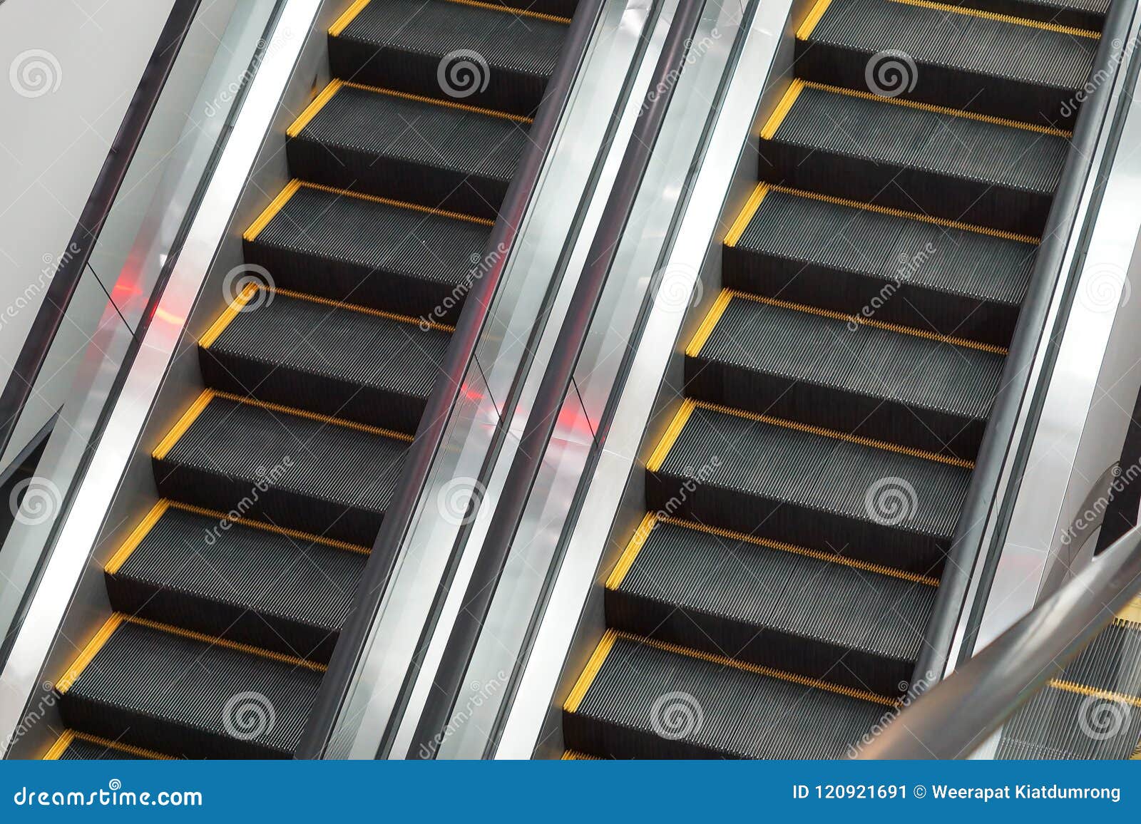 Two escalators stock image. Image of people, technology - 120921691