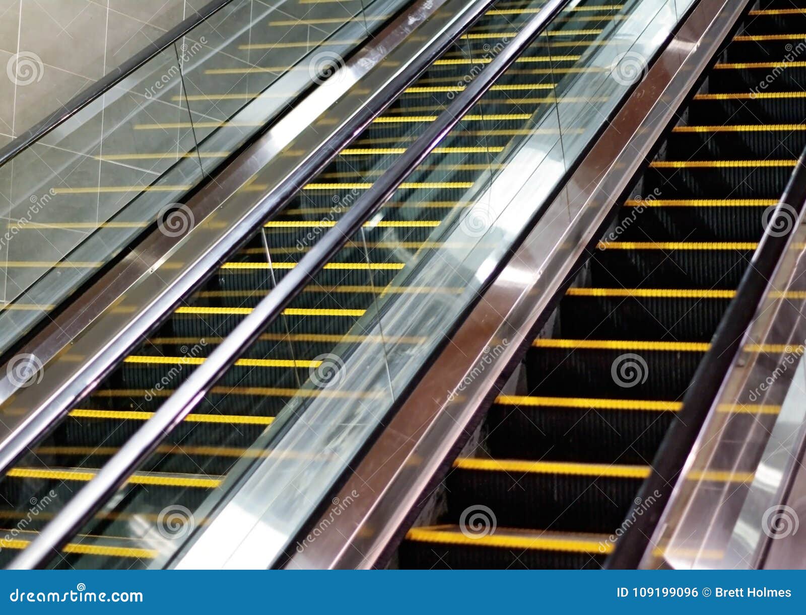 Escalator View from Side with Tiled Wall Stock Photo - Image of metro ...