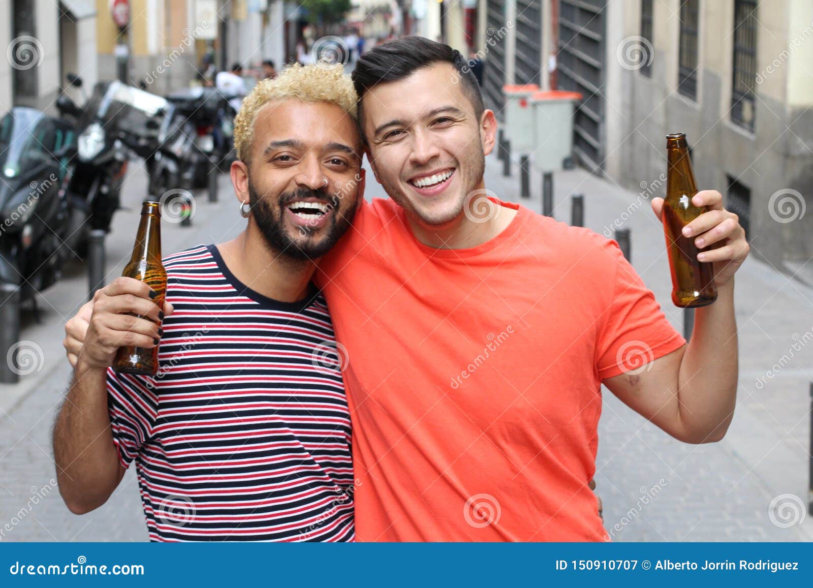 Two Ethnic Men Drinking Beer Outdoors Stock Image - Image of event ...