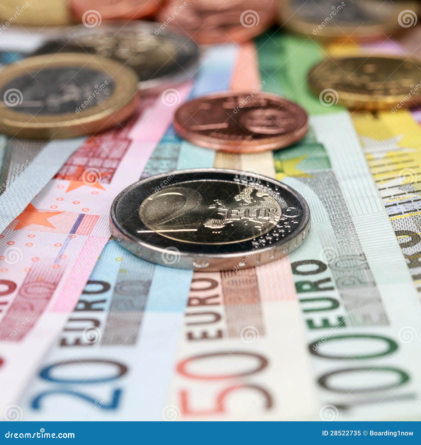 Two Euro coin on banknotes stock image. Image of price - 28522735