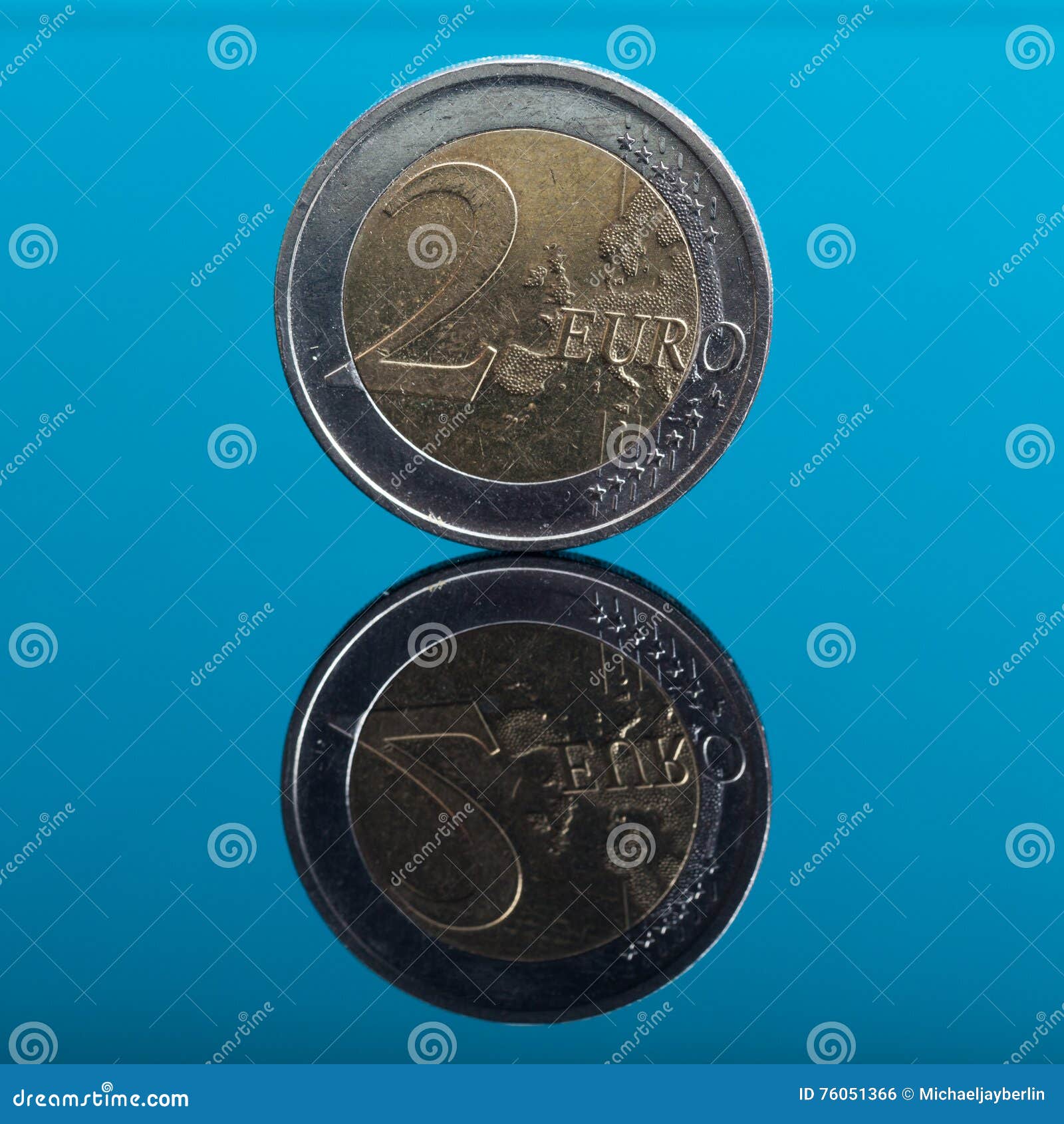 Two Euro Money Coin on Blue with Reflection Stock Photo - Image of ...