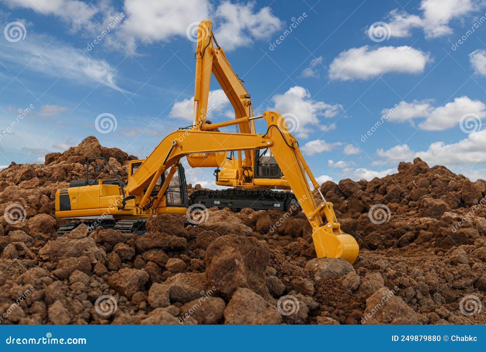 Two Excavator are Digging Soil in the Construction Site on Sky ...