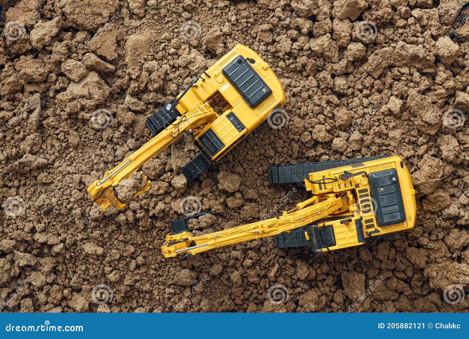 Two Excavators Loader are Digging the Soil in the Construction Site ...