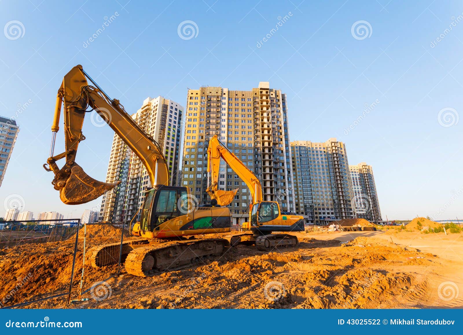 Two Excavators and a New Multistorey Building Stock Photo - Image of ...