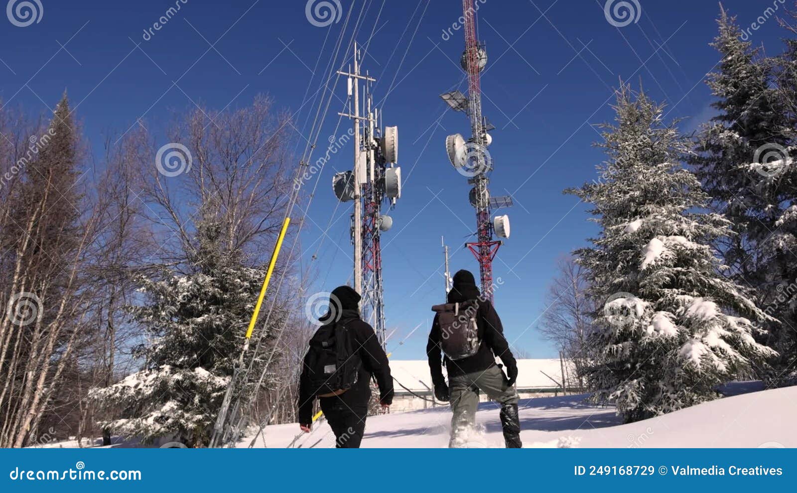 Two Explorers at Telecommunication Tower Base Stock Video - Video of ...
