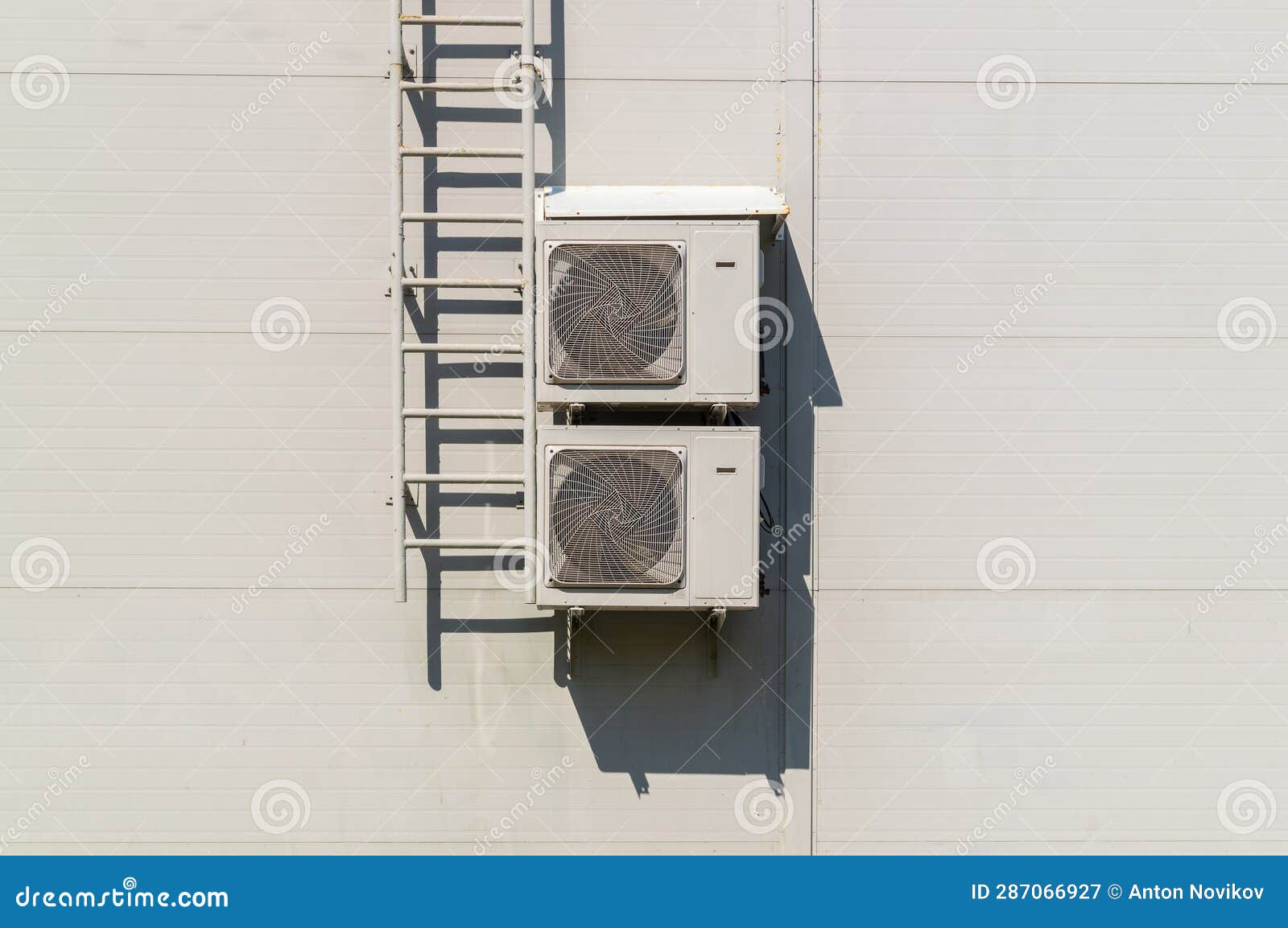 Two External Split System Units on a Gray Wall Stock Image - Image of ...