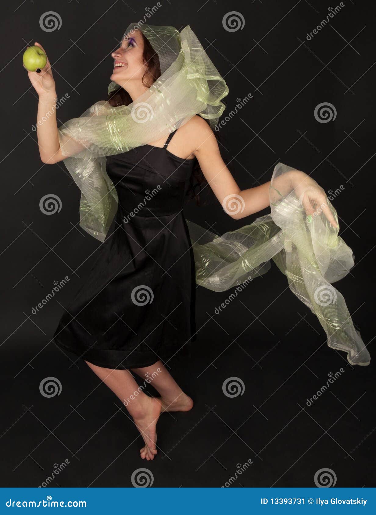 Two-faced Woman with Green Apple Dancing Stock Image - Image of eyes ...