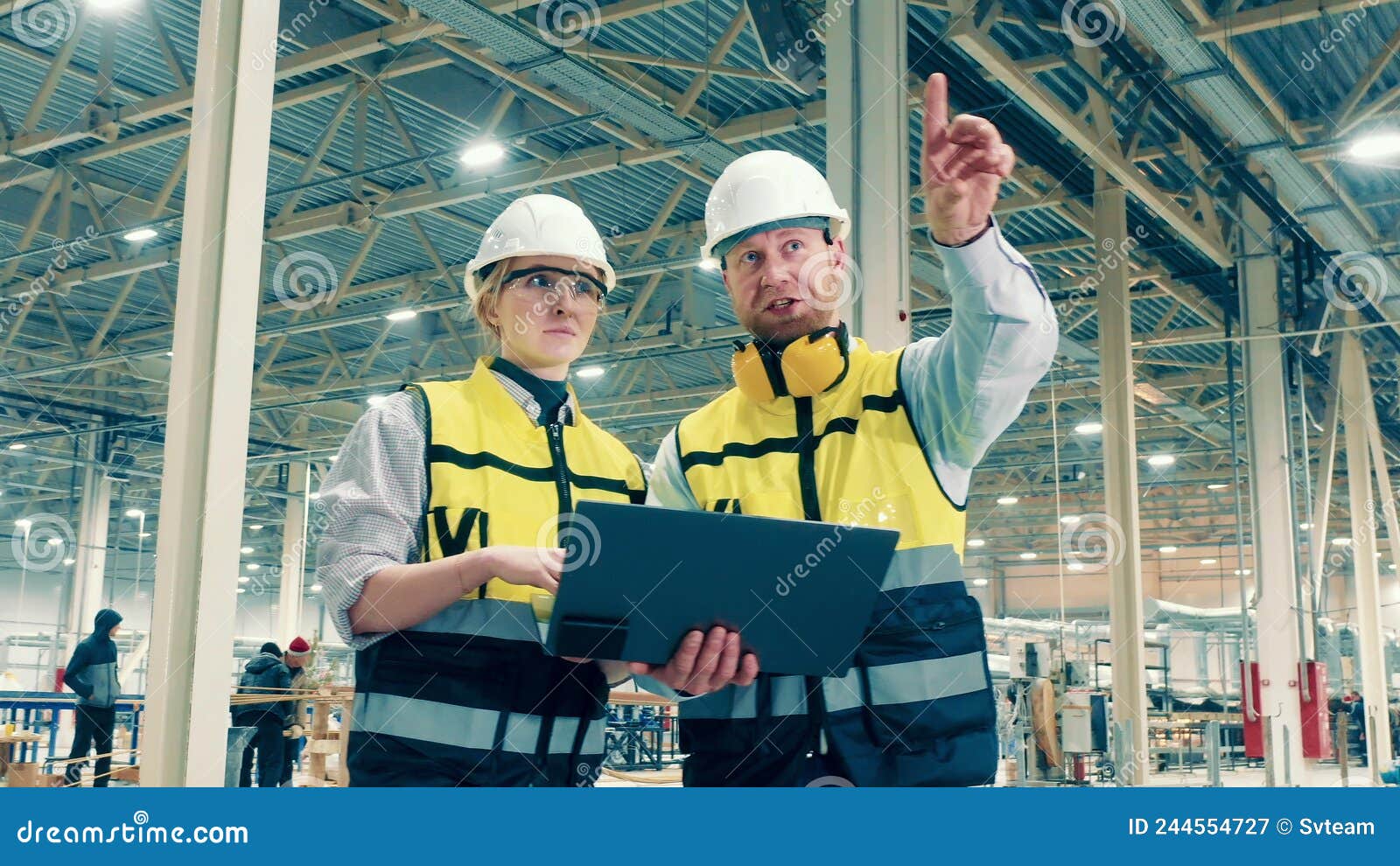 Two Factory Specialists are Smiling while Making Plans Stock Image ...