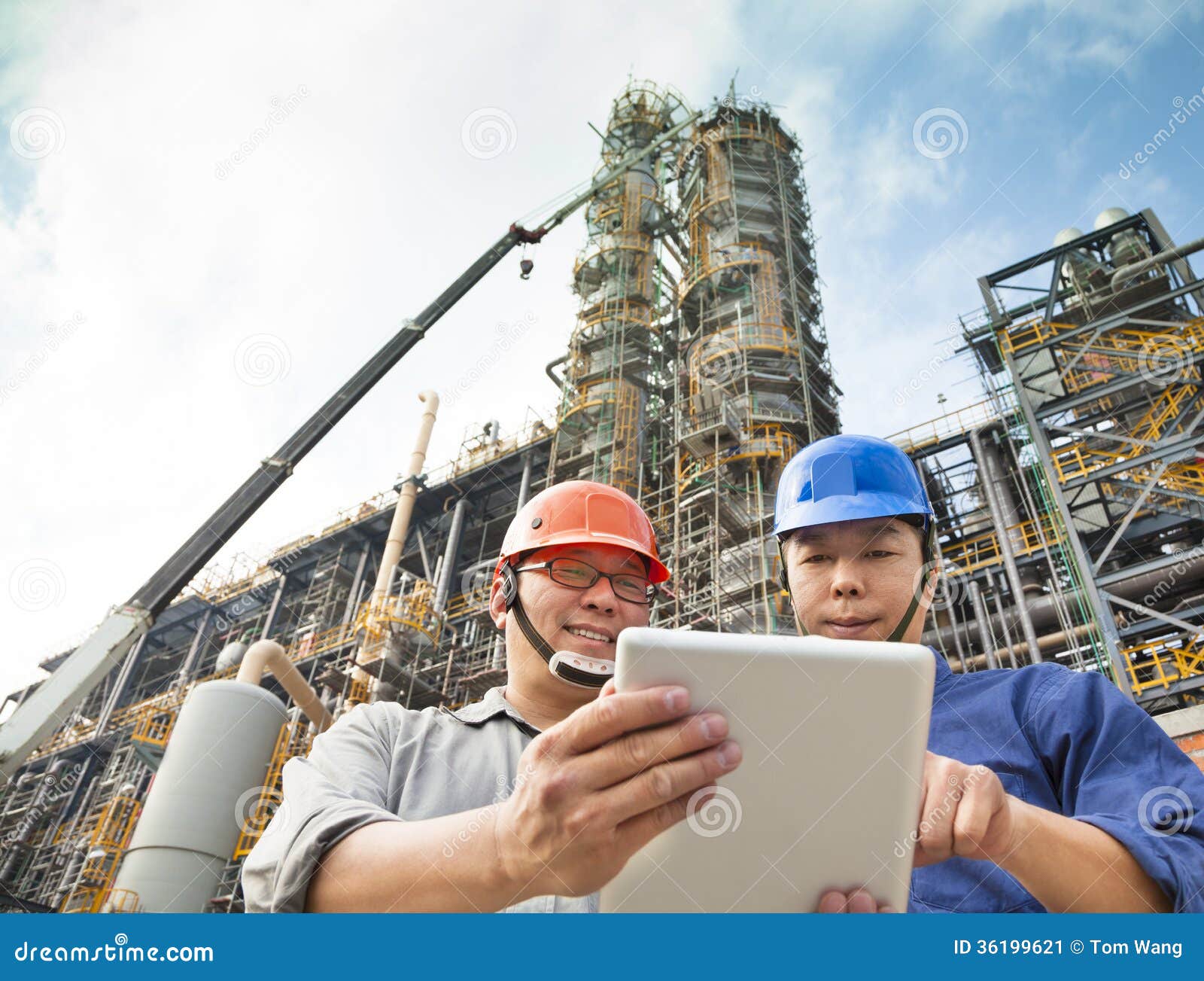 Two Factory Workers Discussion with Tablet Pc Stock Image - Image of ...