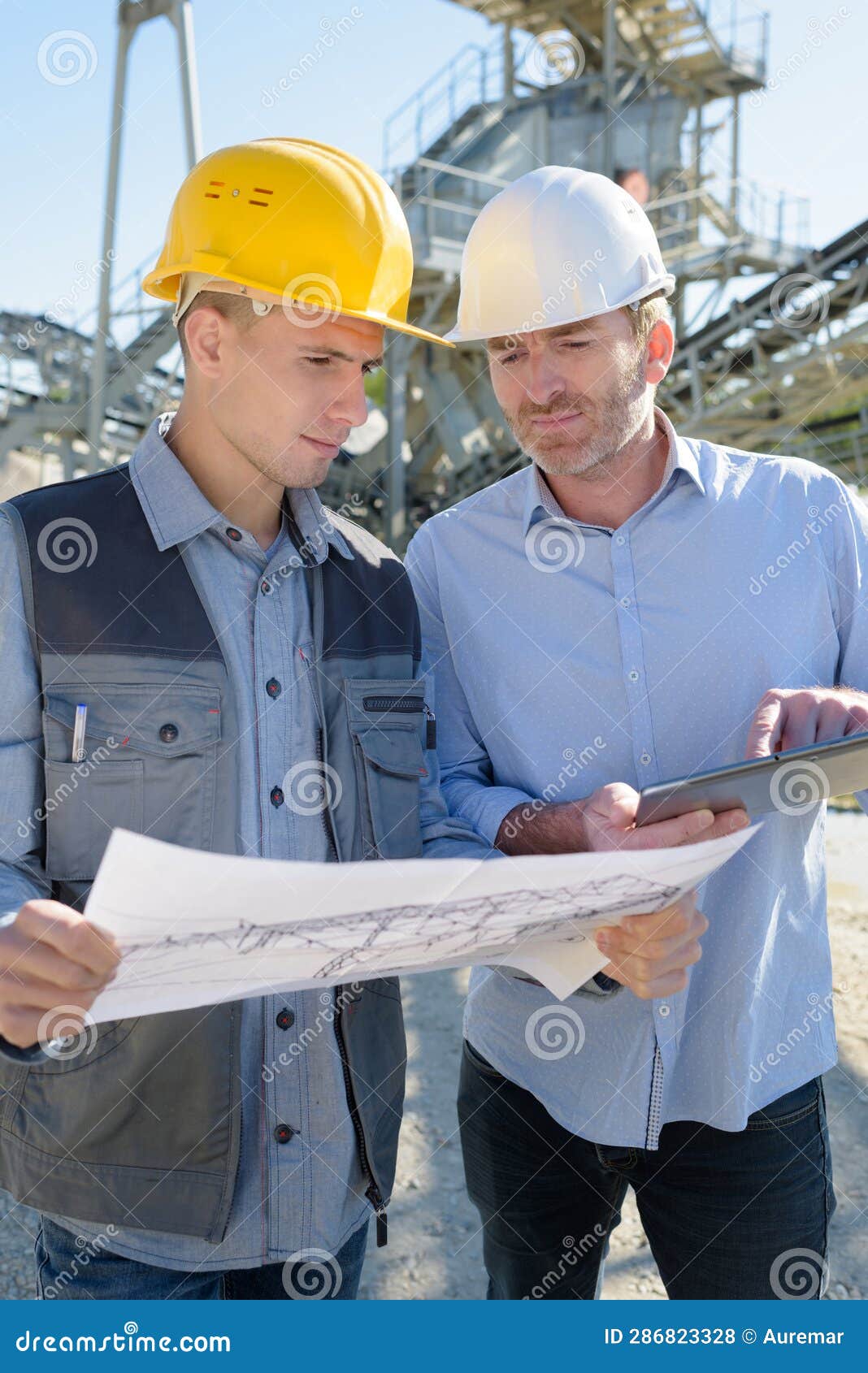 Two Factory Workers Outdoors Stock Photo - Image of refinery ...