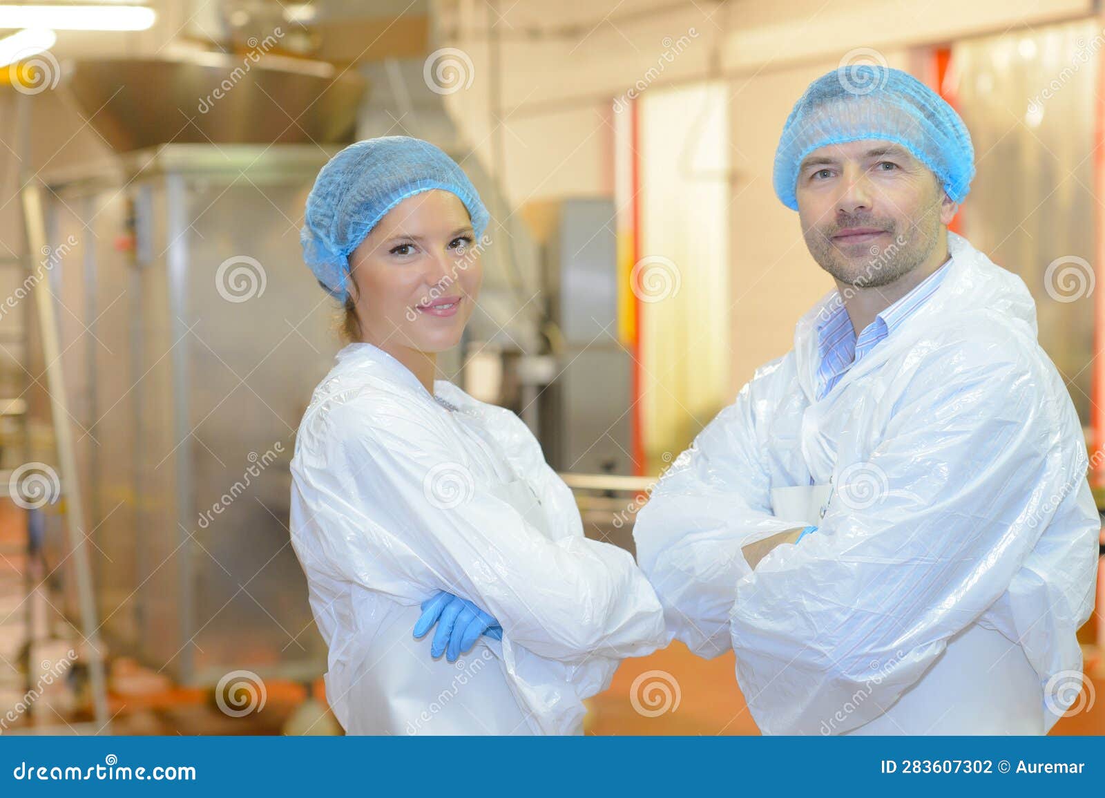 Two Factory Workers Stood with Their Arms Folded Stock Photo - Image of ... Two Factory Workers Stood with Their Arms Folded Stock Photo - Image of ...
