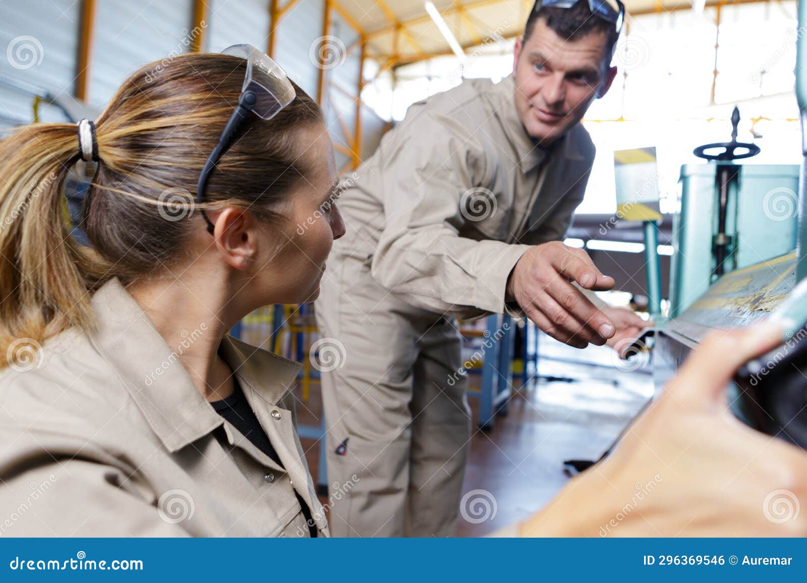 Two Factory Workers Talking Stock Photo - Image of checking, writing ...