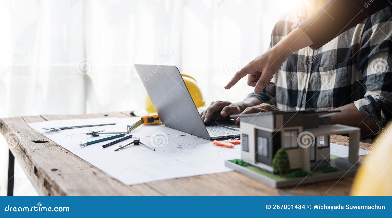 Two Factory Workers Working and Discussing Manufacturing Plan in the ...