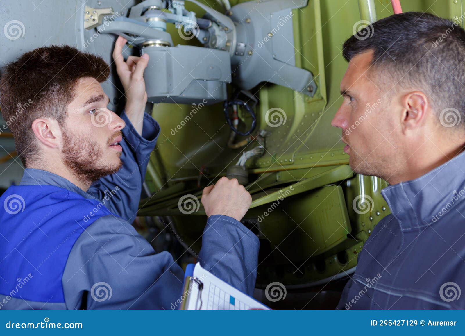 Two Factory Workers Working on Machine Stock Image - Image of cheerful ...