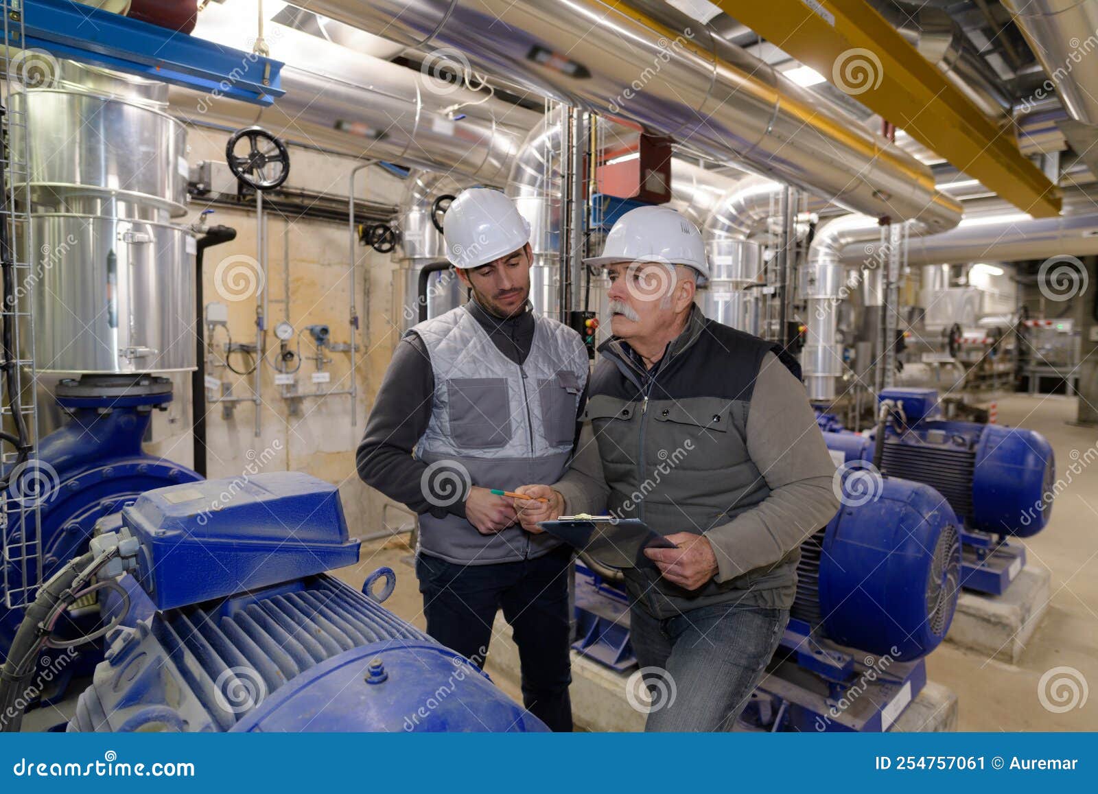 Two Factory Workers in Workshop Stock Image - Image of workshop ...