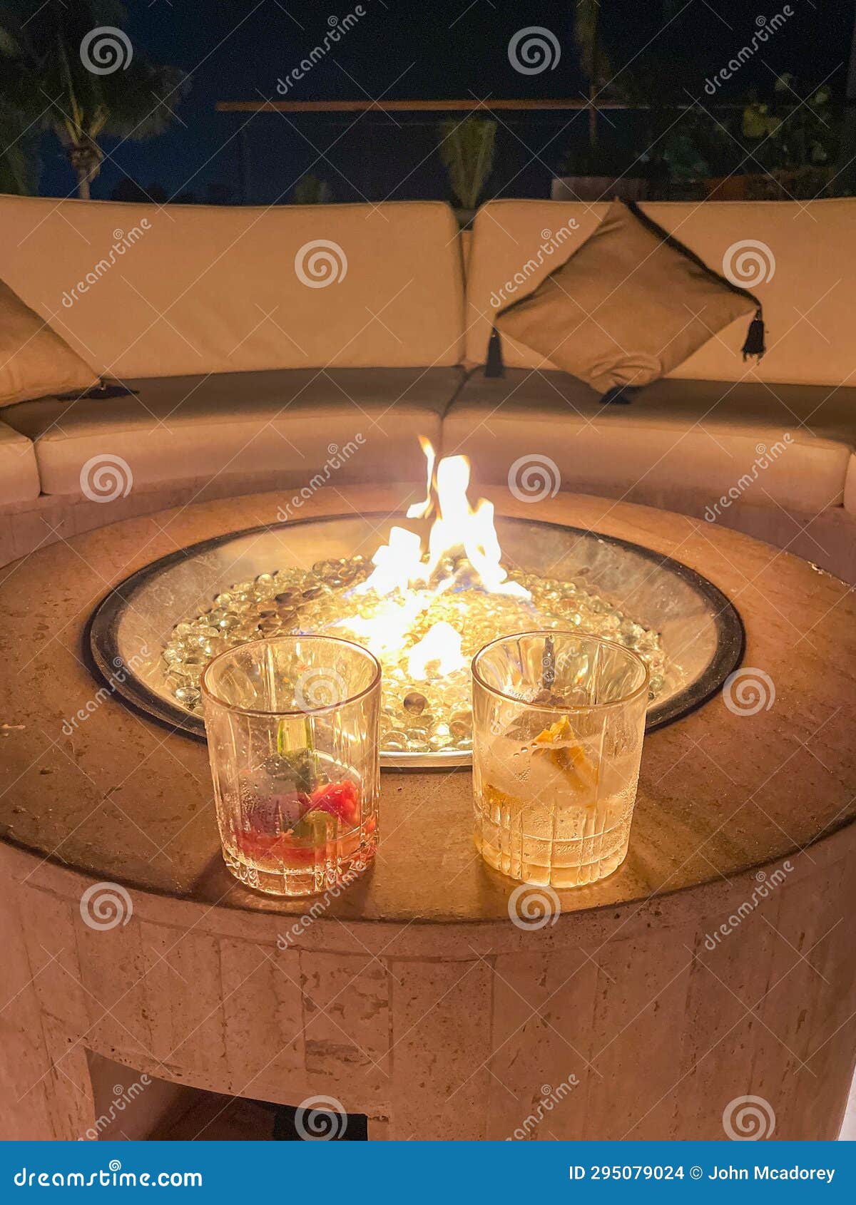 Two Fancy Drinks in Front of a Propane Gas Fire Pit at an Outdoor Bar ...