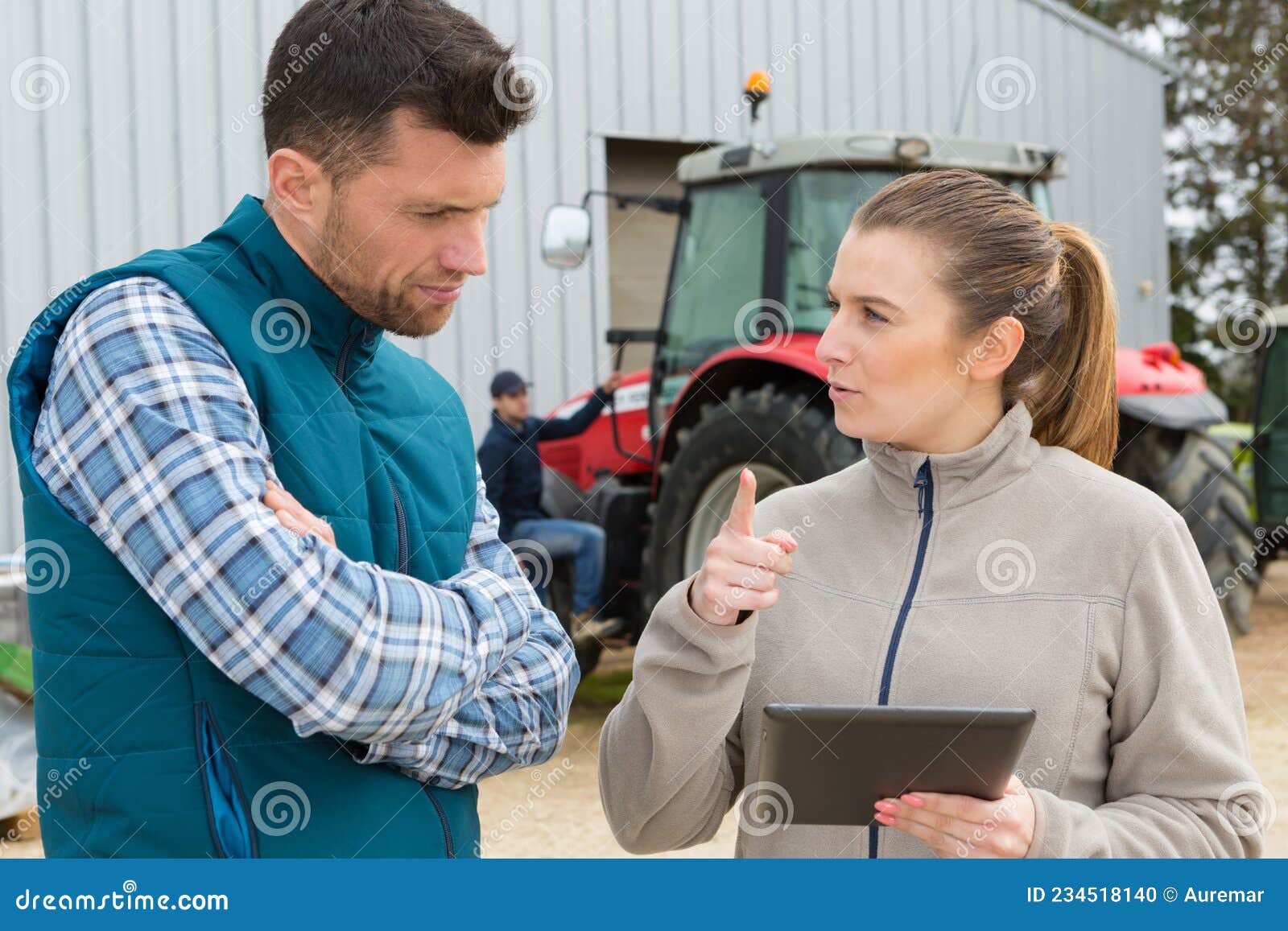 Two Farmers Talking with Tablet Stock Photo - Image of woman, machinery ...