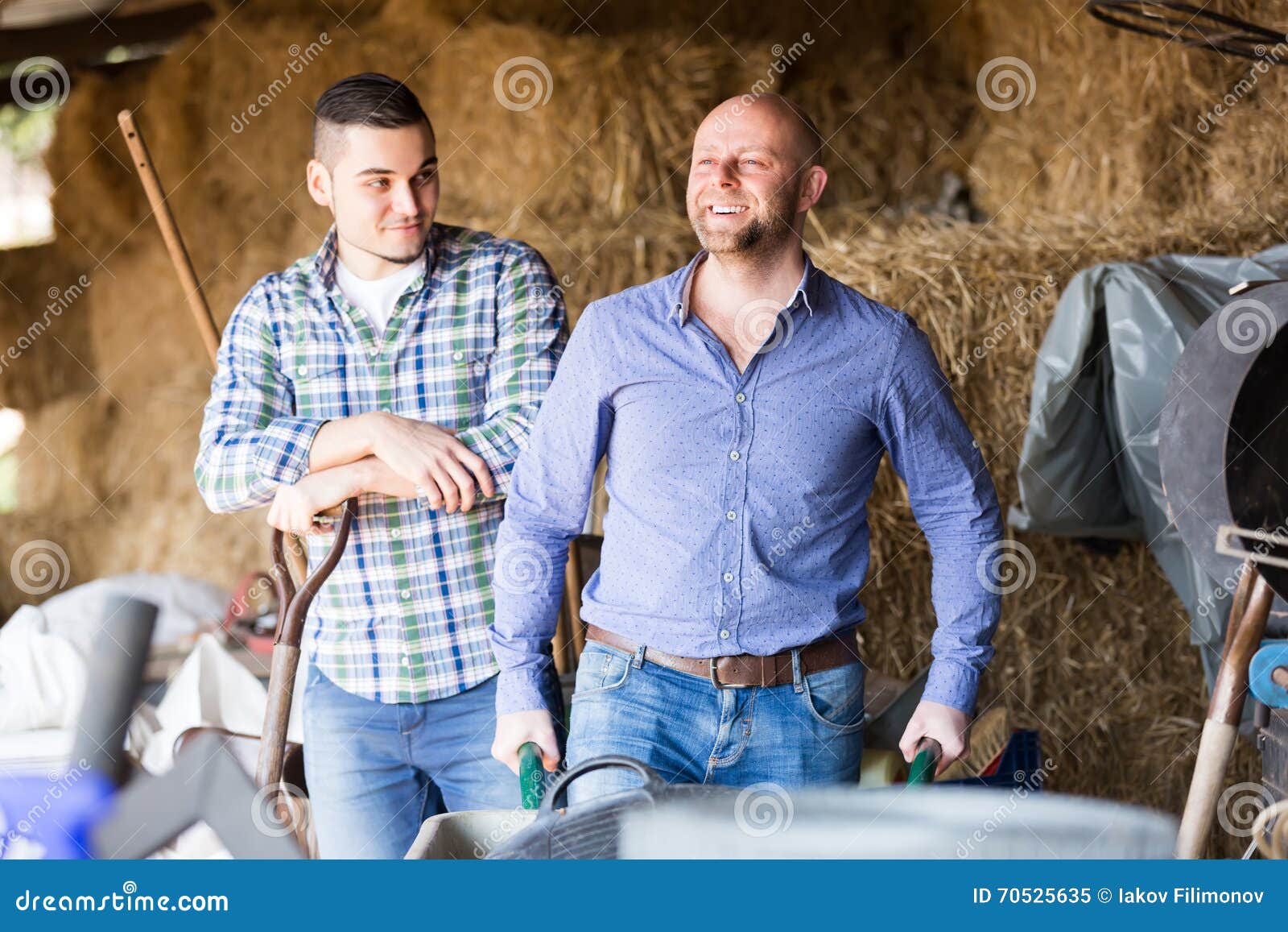 Two Farmers Working in Barn Stock Image - Image of farming, positive ...