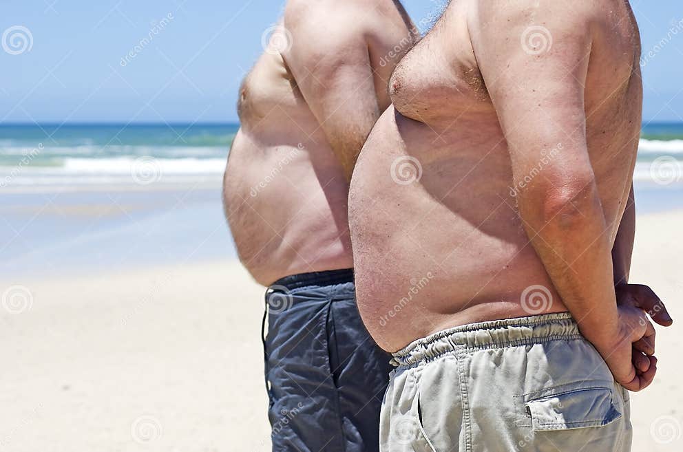 Two fat men on the beach stock image. Image of figure - 13301063