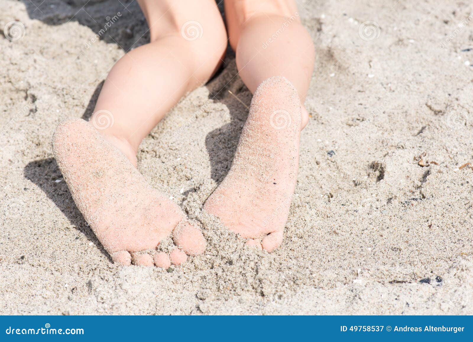 Two Feet of a Boy in Sand at at Beach Stock Image - Image of shore ...