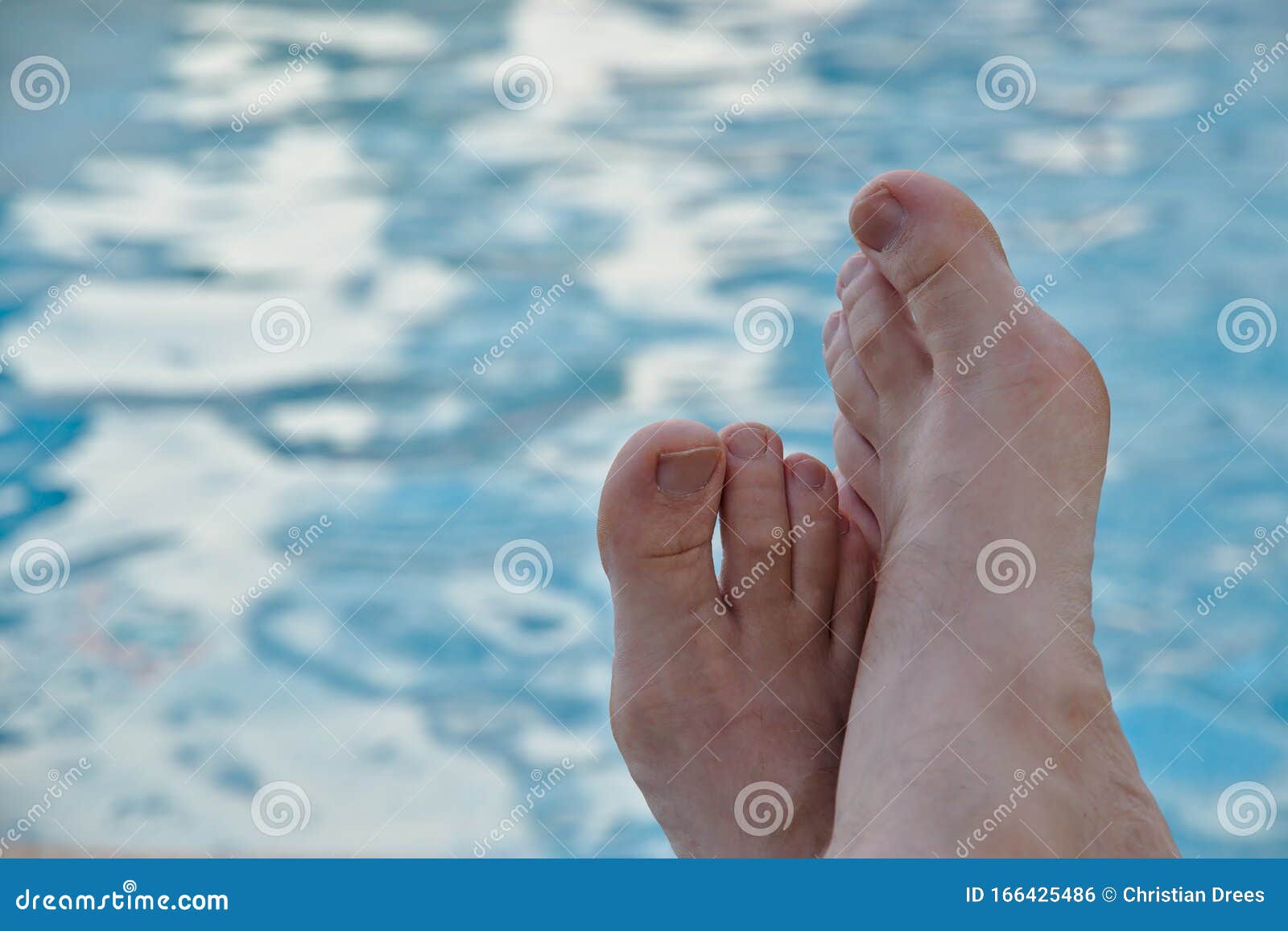 Two Feet in Front of Blue Water Stock Photo - Image of bathe, blue ...