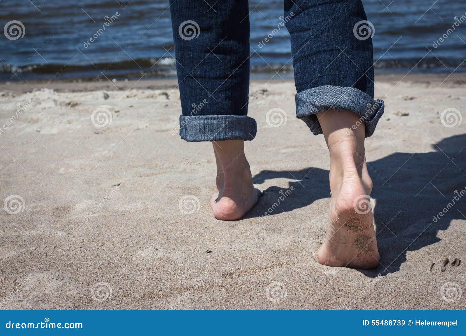 Two Feet from the Knees Down Walking on Beach in Summer. Stock Image ...
