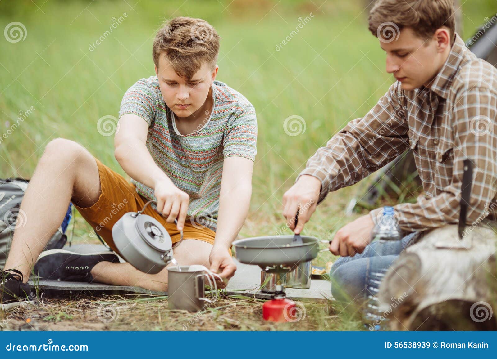 Two Fellow Campers Making Tea and Preparing Food Stock Image - Image of ...
